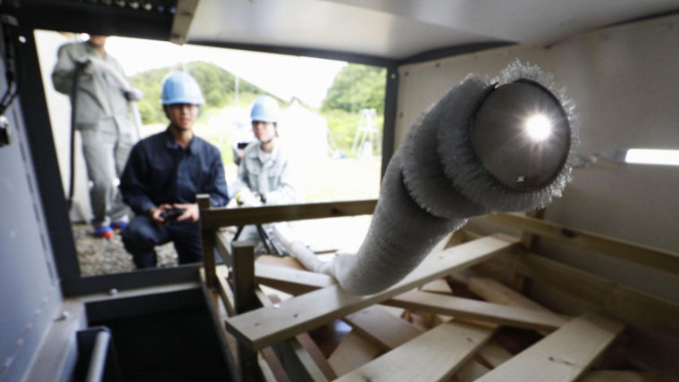 Japanese researchers are developing a giant snake robot to explore ...