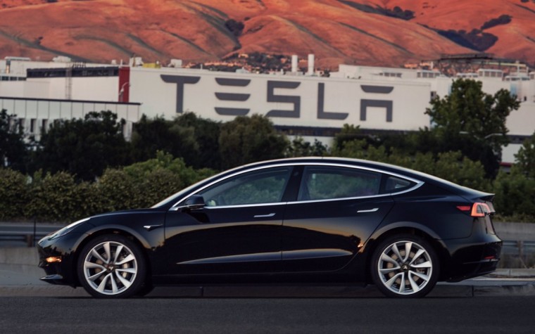 Tesla CEO Elon Musk shares photos of the first production Model 3 - Neowin