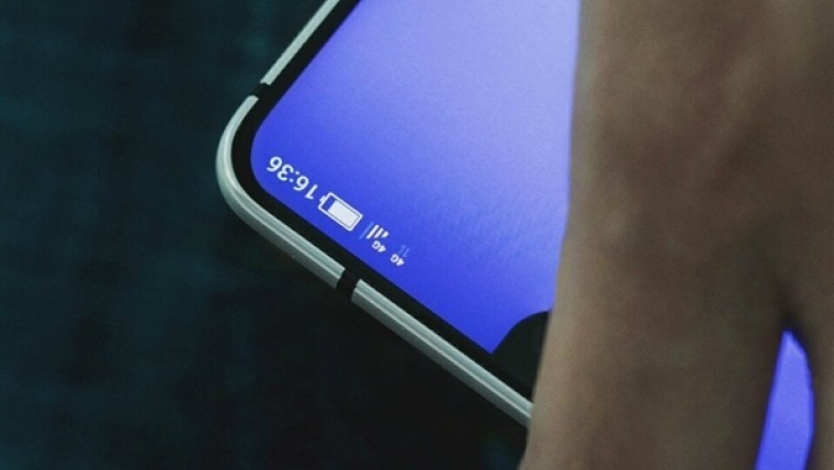 Sharp's bezel-less phone snapped in Essential-style photo, showing ...